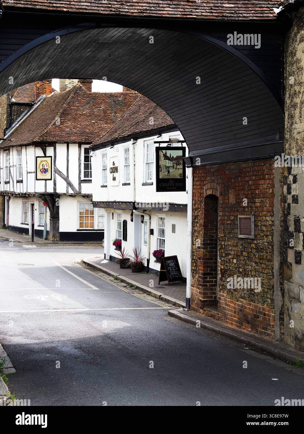 Historic Pubs viewed through The Barbican in Sandwich Kent England ...