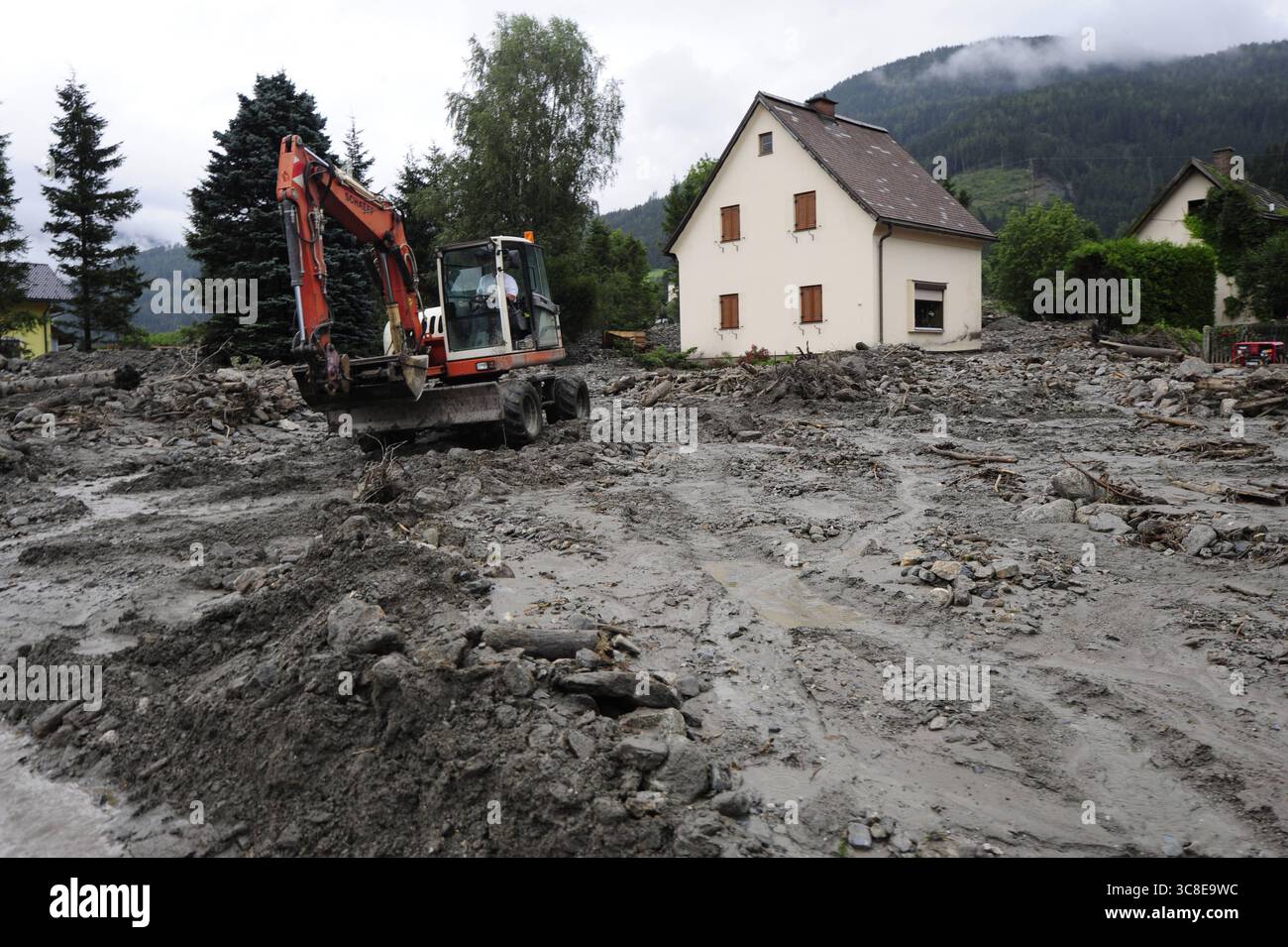 building in a flooded area after heavy rainfalls, muddy water building ...