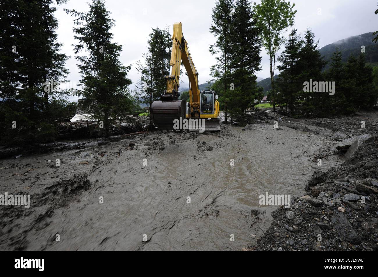 storm damage caused by mudslides, debris and mud after heavy rainfalls ...
