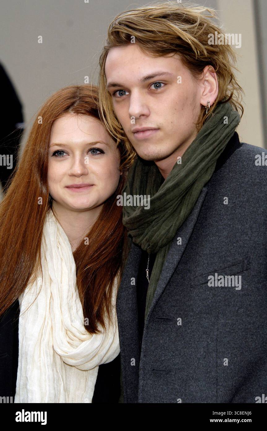 Bonnie Wright and Jamie Campbell Bower arriving for the Burberry ...
