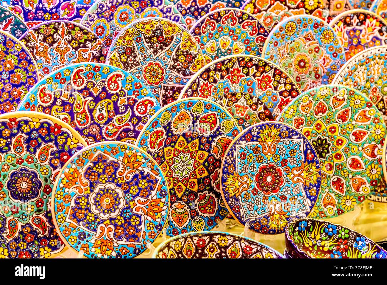 Traditional arabic colorful ceramic plates at Dubai Market souk, United ...