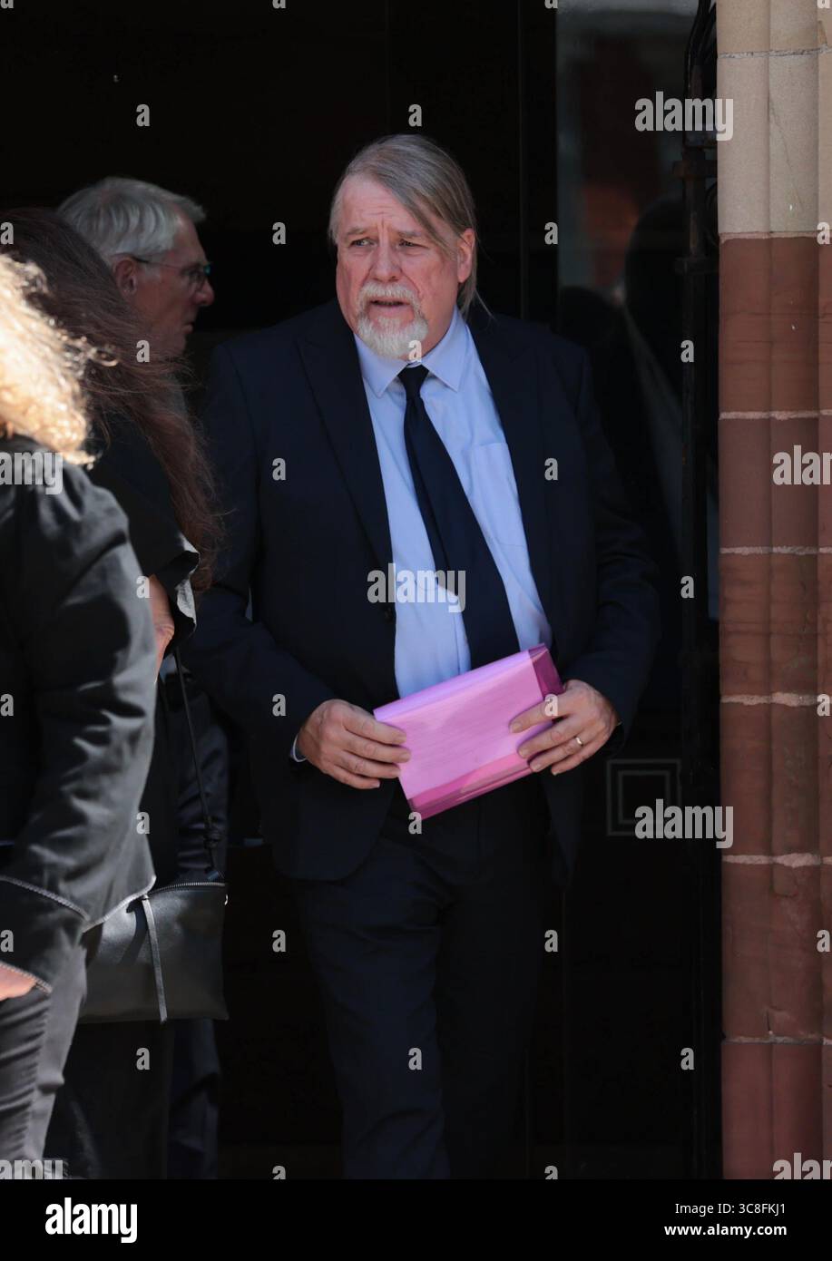 Mike Edgar leaves St Mark's Church, Dundela, in East Belfast, after ...