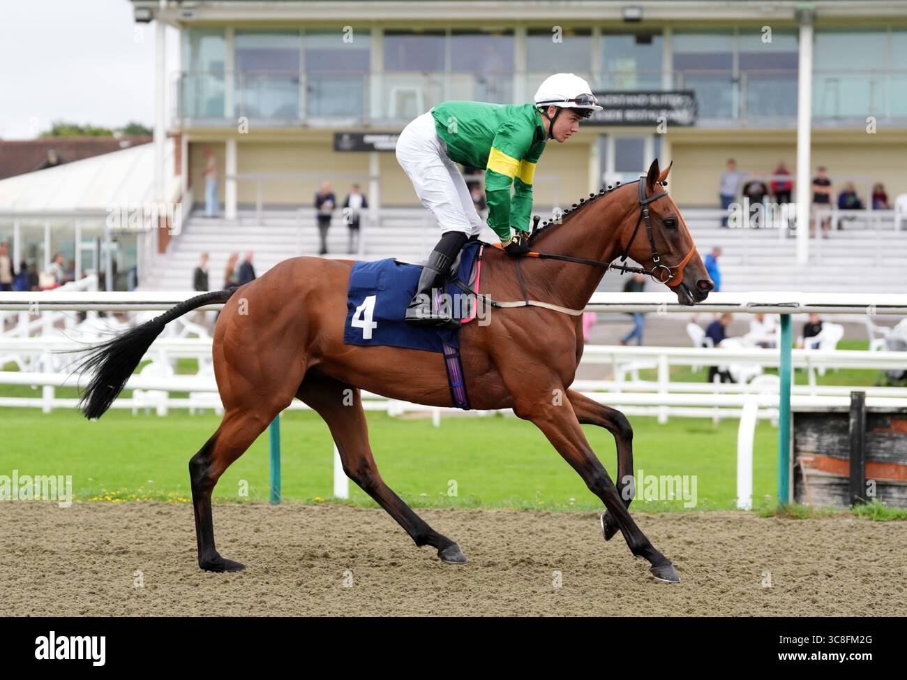 This Time Maybe and jockey George Bass going to post before the Get ...