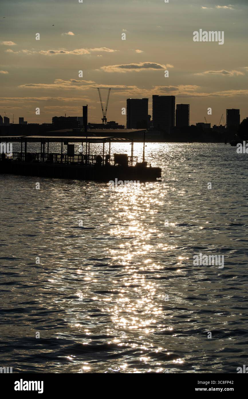 Greenwich boat station at sunset Stock Photo - Alamy