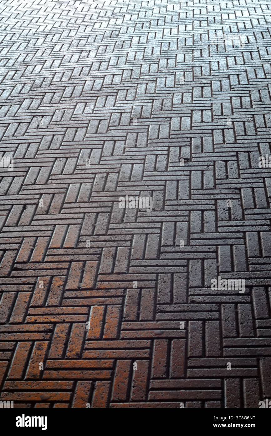 Rectangular bricks interlocking in herringbone arrangement, generating ...