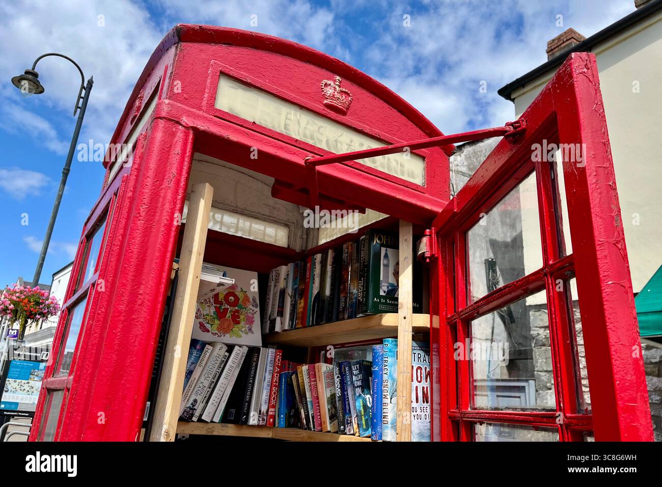 A traditional Red Telephone Box that has been converted into a ...