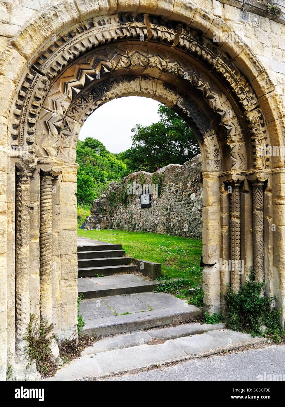 Remains of St James Church featuring a Norman zigzag arch in Dover Kent ...
