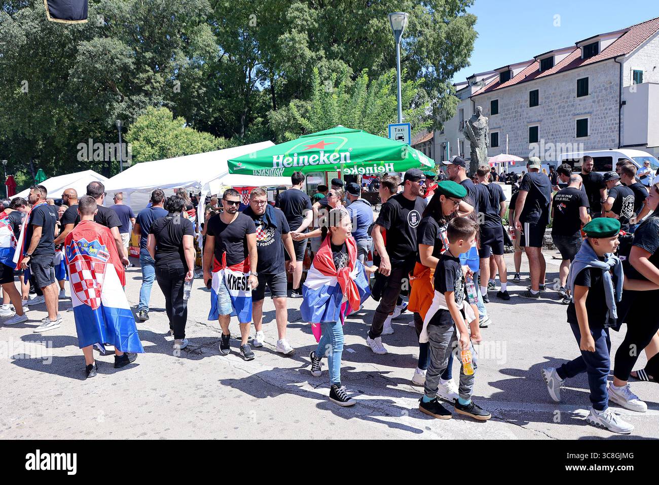 Fans of Marko Perkovic Thompson are seen in Sinj, Croatia on August 04 ...