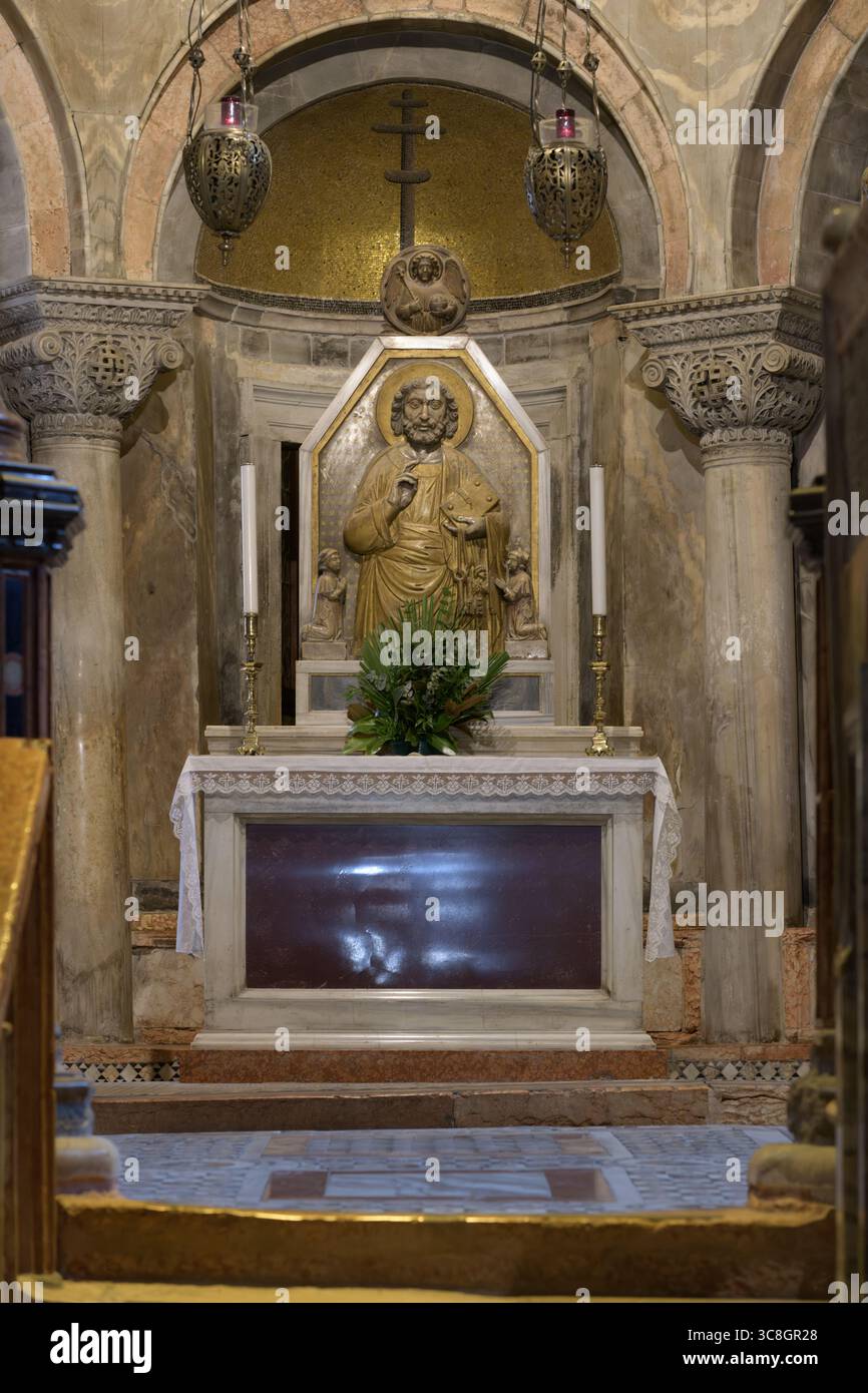 Marble altar with statue of saint inside the Basilica of St Mark ...