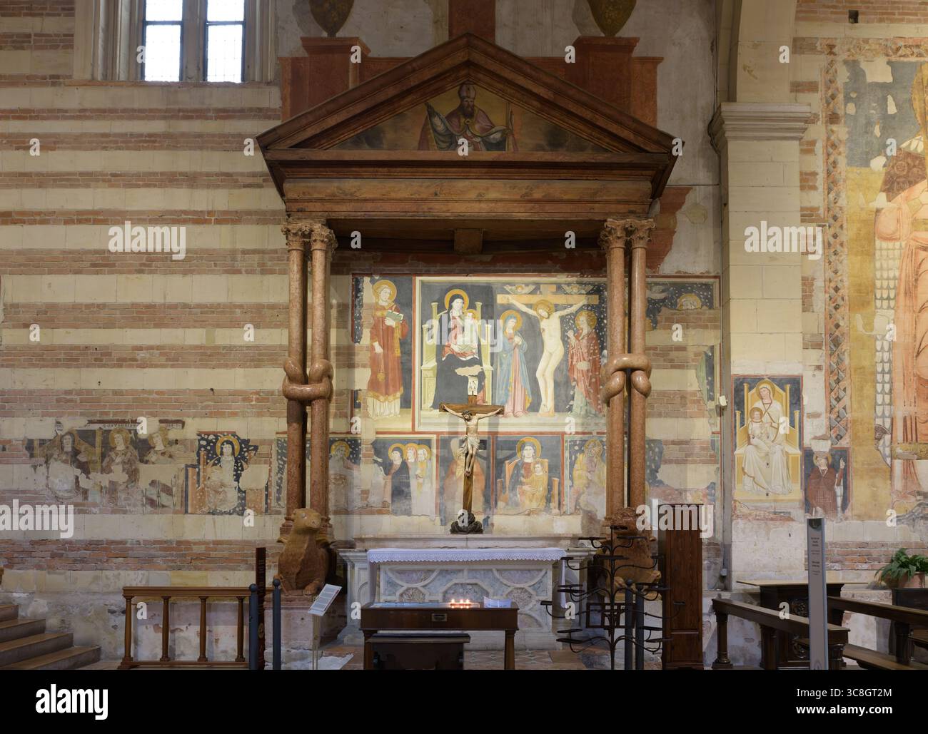 Romanesque altar with 13th-century twisted columns and frescoes by the ...