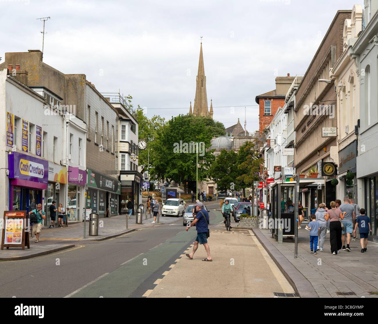 Shops in street of historic buildings, Union Street, Torquay, Devon ...