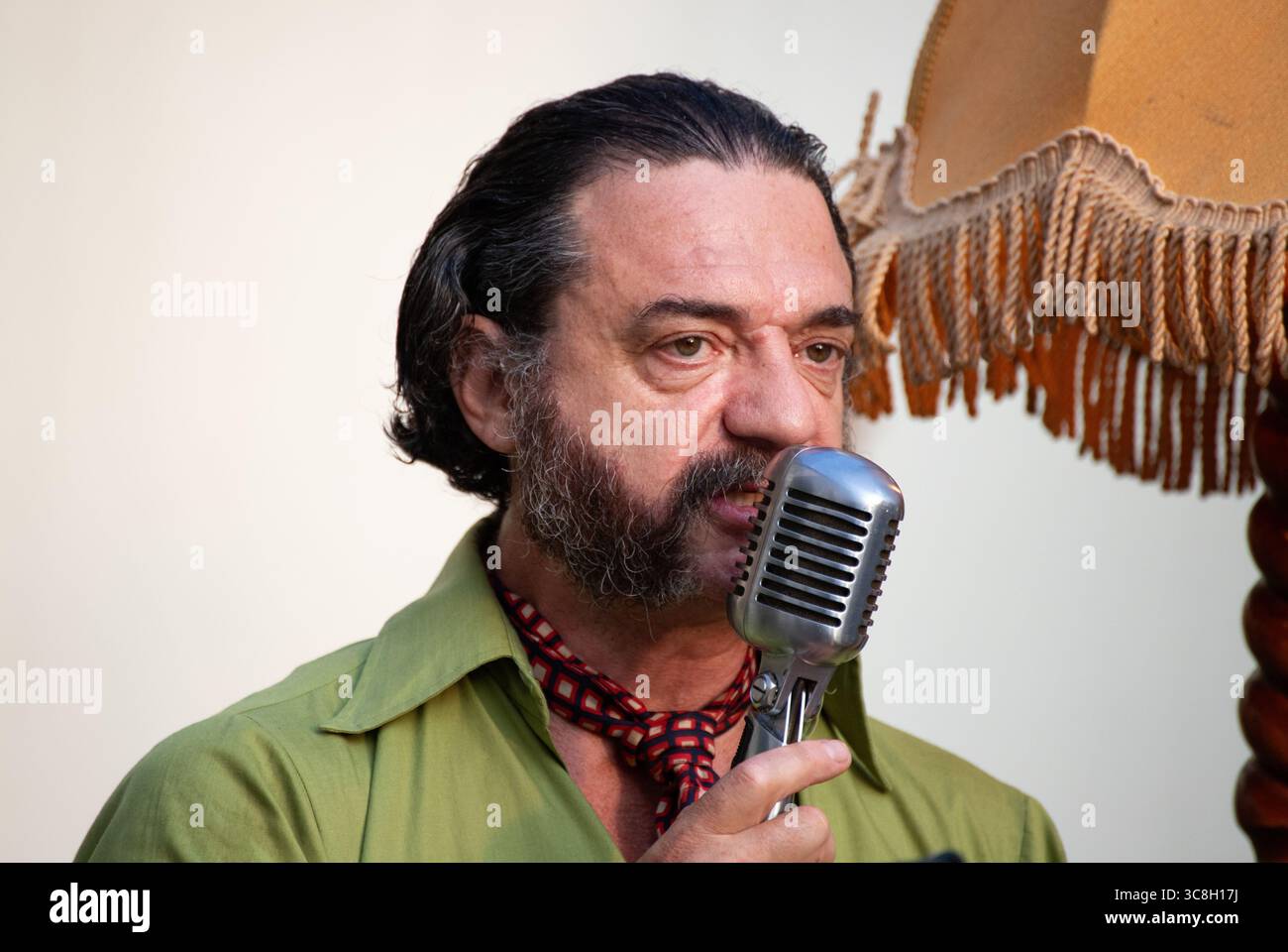 The singer showcases his vocal skills in an energetic outdoor jazz ...