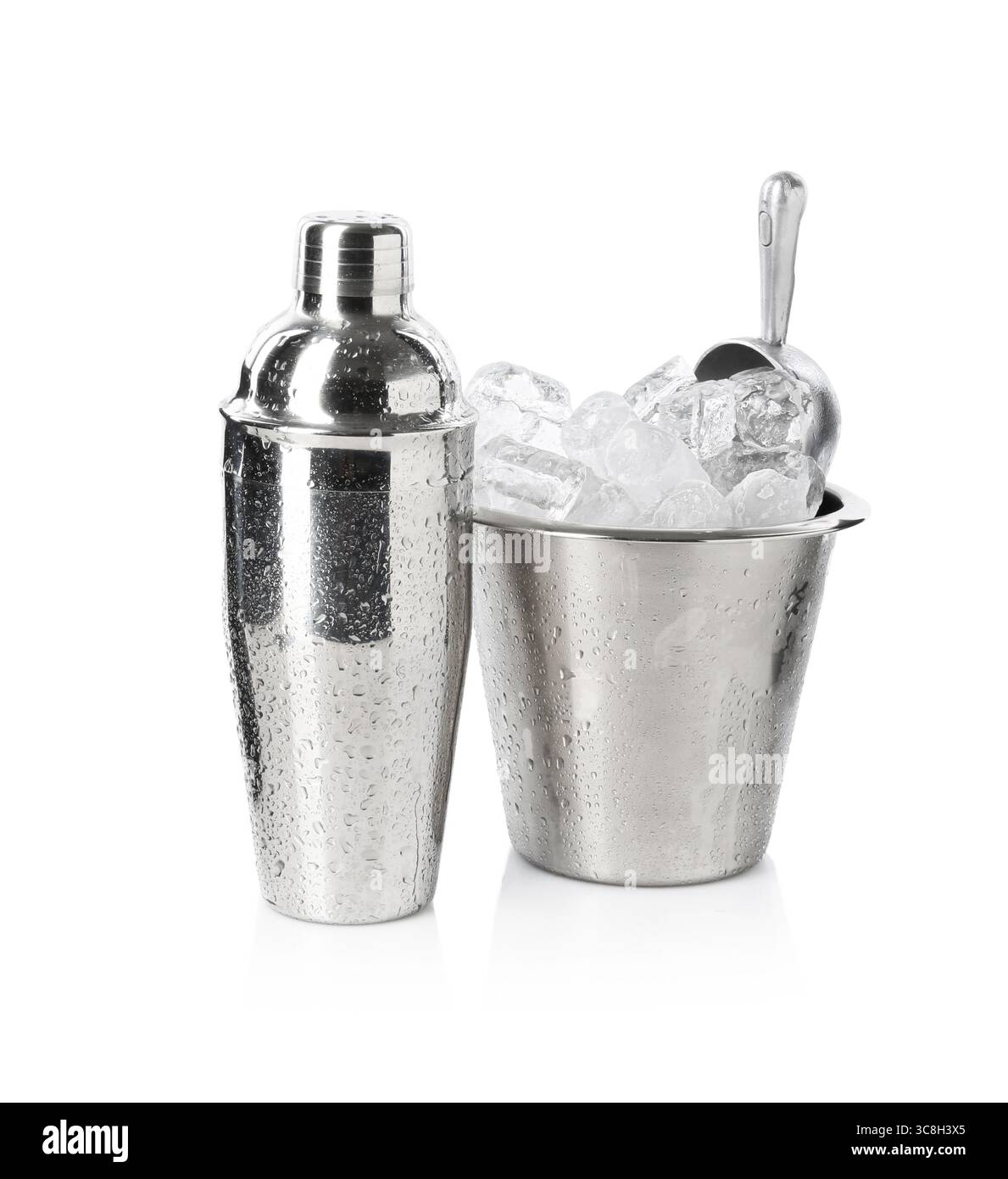 Ice in bucket and metal cocktail shaker isolated on white Stock Photo ...