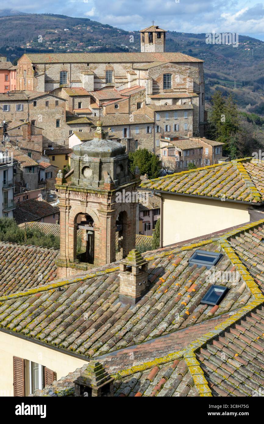 View of the rooftops in Perugia, Italy, with a historical church tower ...