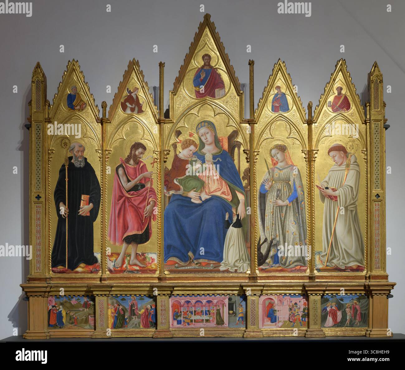 A Gothic polyptych by Domenico di Bartolo, created around 1438. It ...