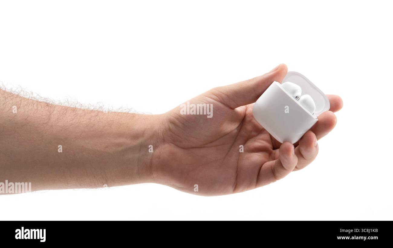 Minimalistic design wireless earphones inside hi-res stock photography ...