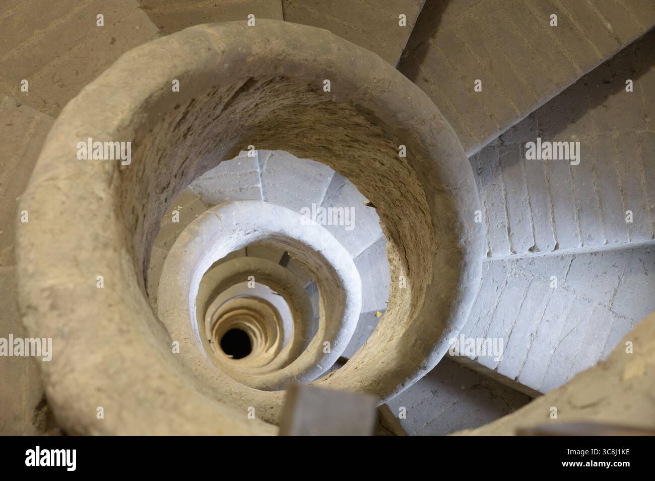 Ancient spiral staircase with brick steps and central hollow core ...