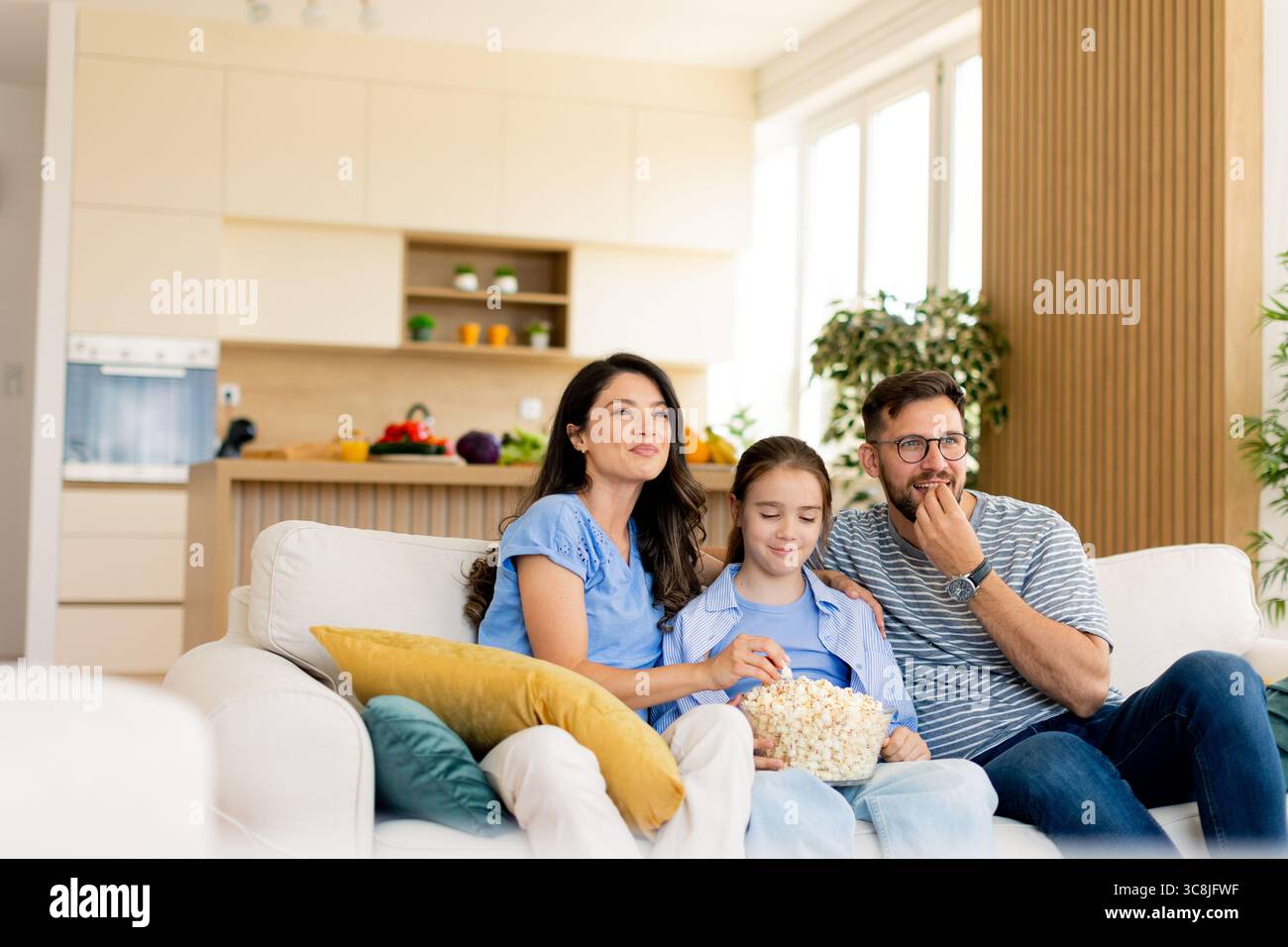 Family members gather in cozy hi-res stock photography and images - Alamy