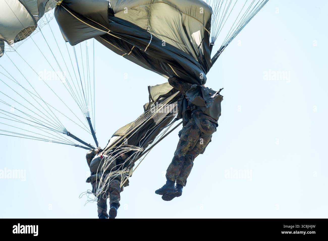 Two German soldiers getting tangled mid-air during their jump while ...