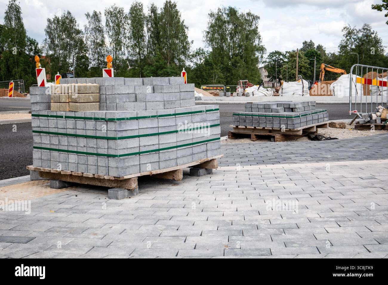 Paving Blocks on Pallets at Road Construction Site Stock Photo - Alamy