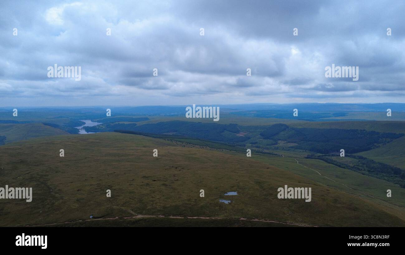 Aerial View Over Brecon Beacons Moorland and Reservoirs Under Moody ...