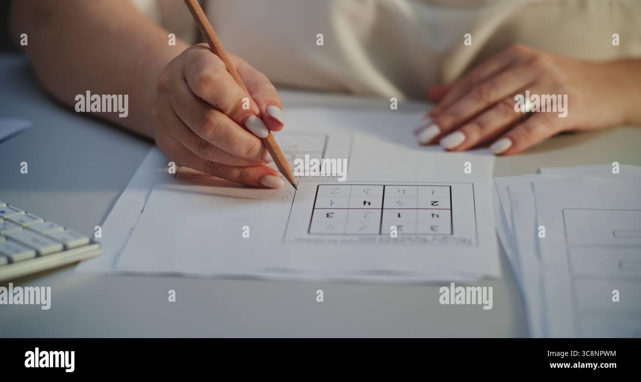 Teacher grading math homework hi-res stock photography and images - Alamy