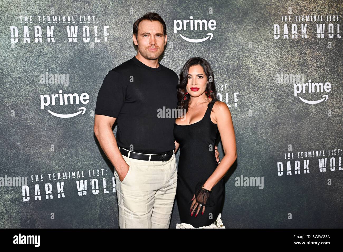 Chris Romrell, left, and Katherine Ro attend the premiere of "The ...