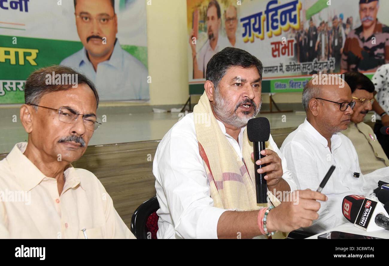 PATNA, INDIA - AUGUST 4: AICC secretary Pranav Jha addressing a press ...