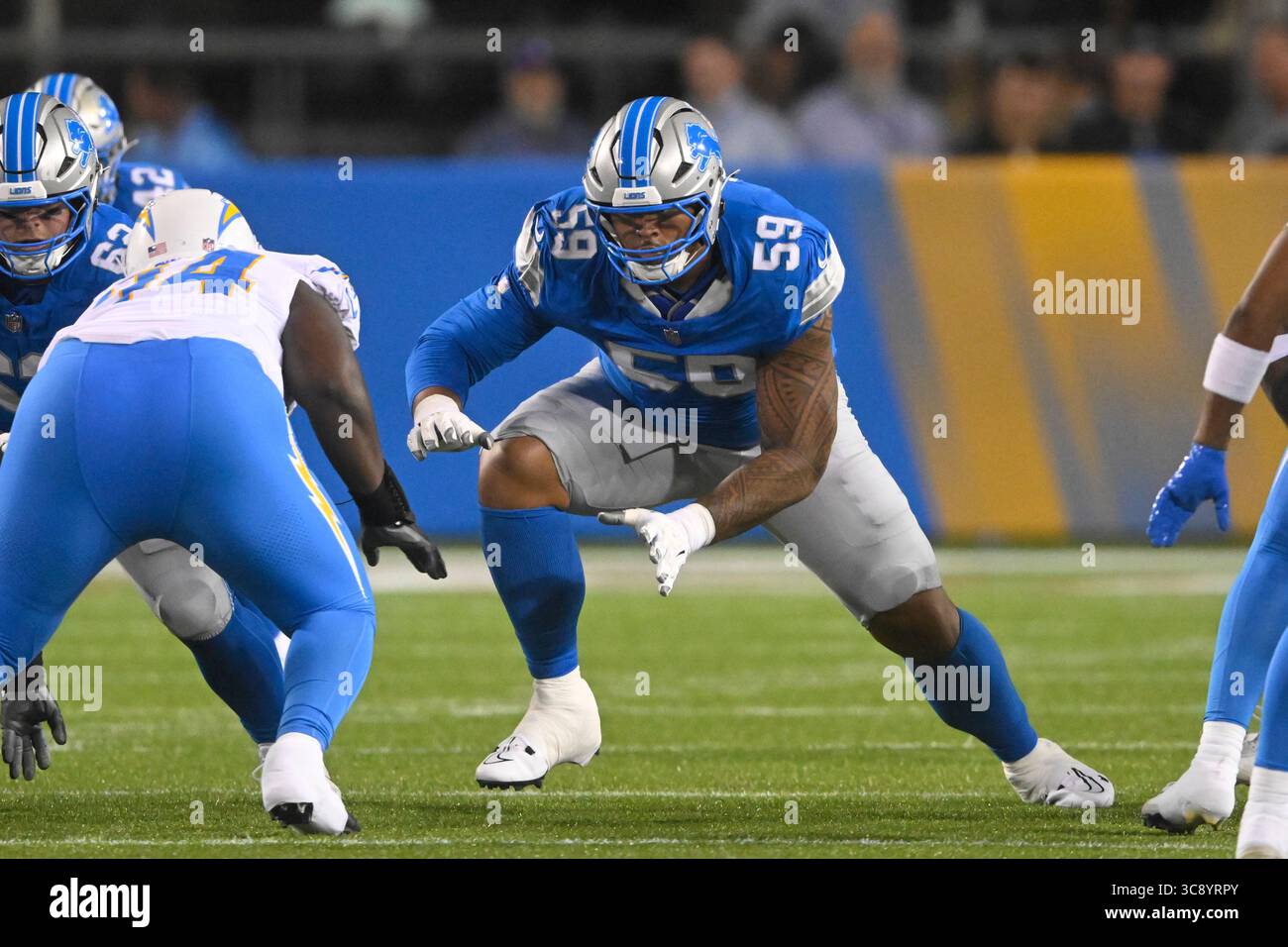 Detroit Lions offensive tackle Giovanni Manu (59) blocks during the Pro ...