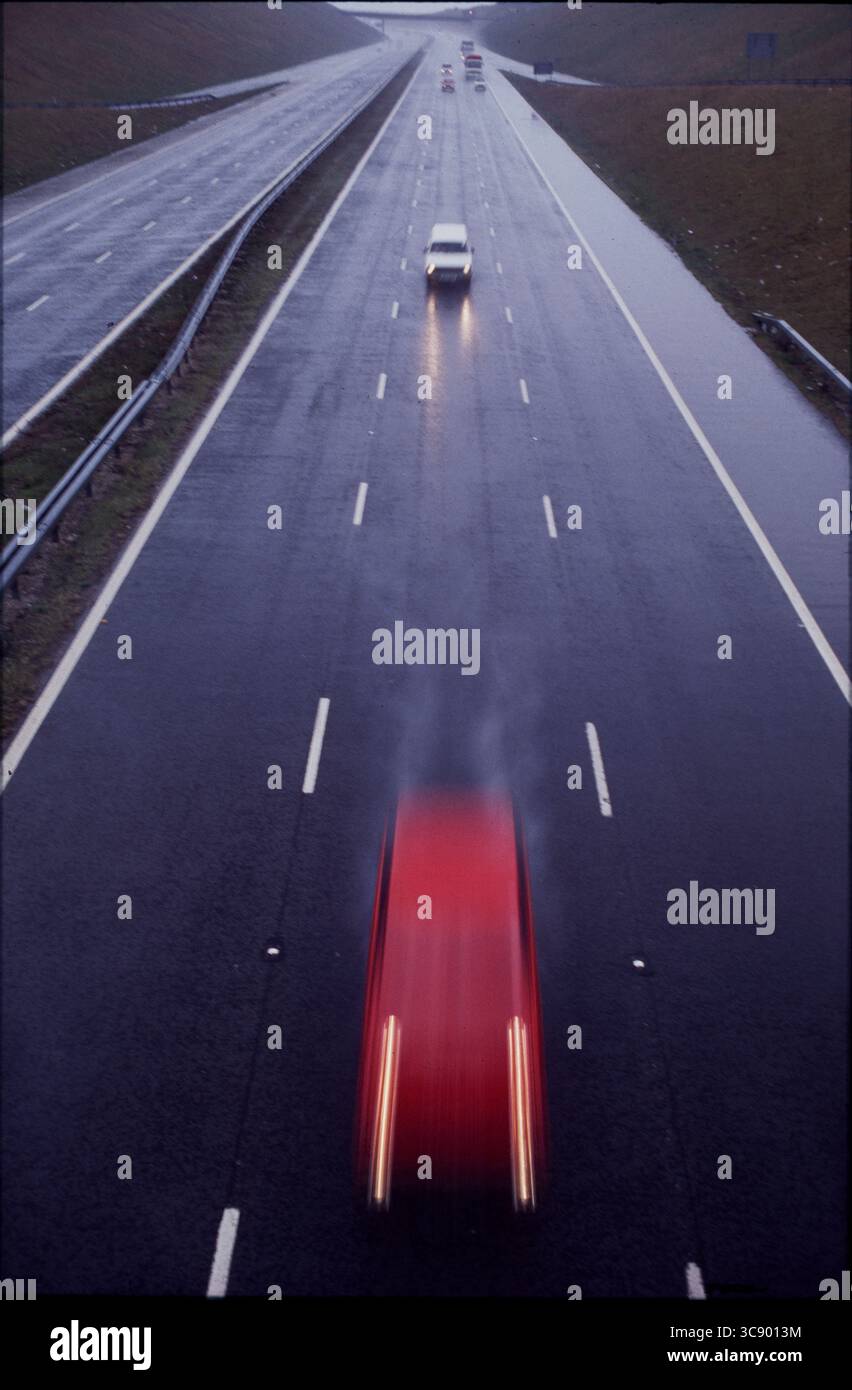 Motorway, red car, UK 1987 Stock Photo - Alamy