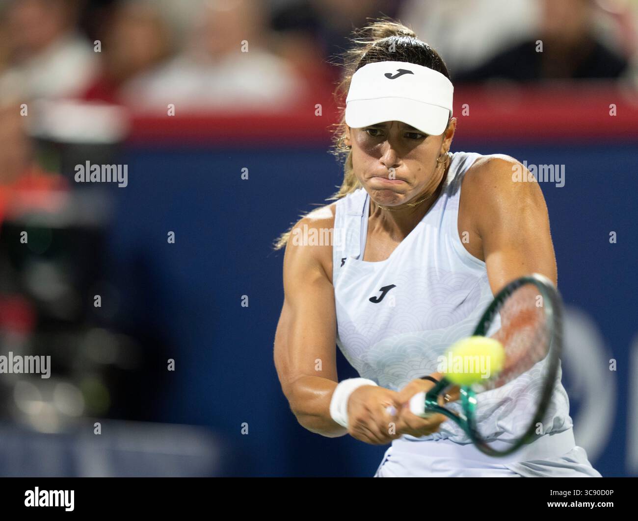 Jessica Bouzas Maneiro, of Spain, hits a return to Victoria Mboko, of ...