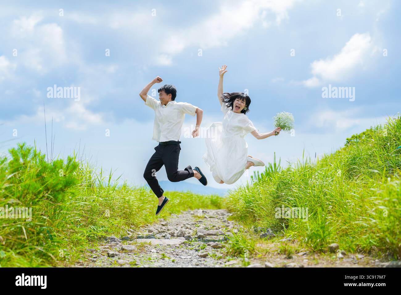 Family run jump on hi-res stock photography and images - Alamy