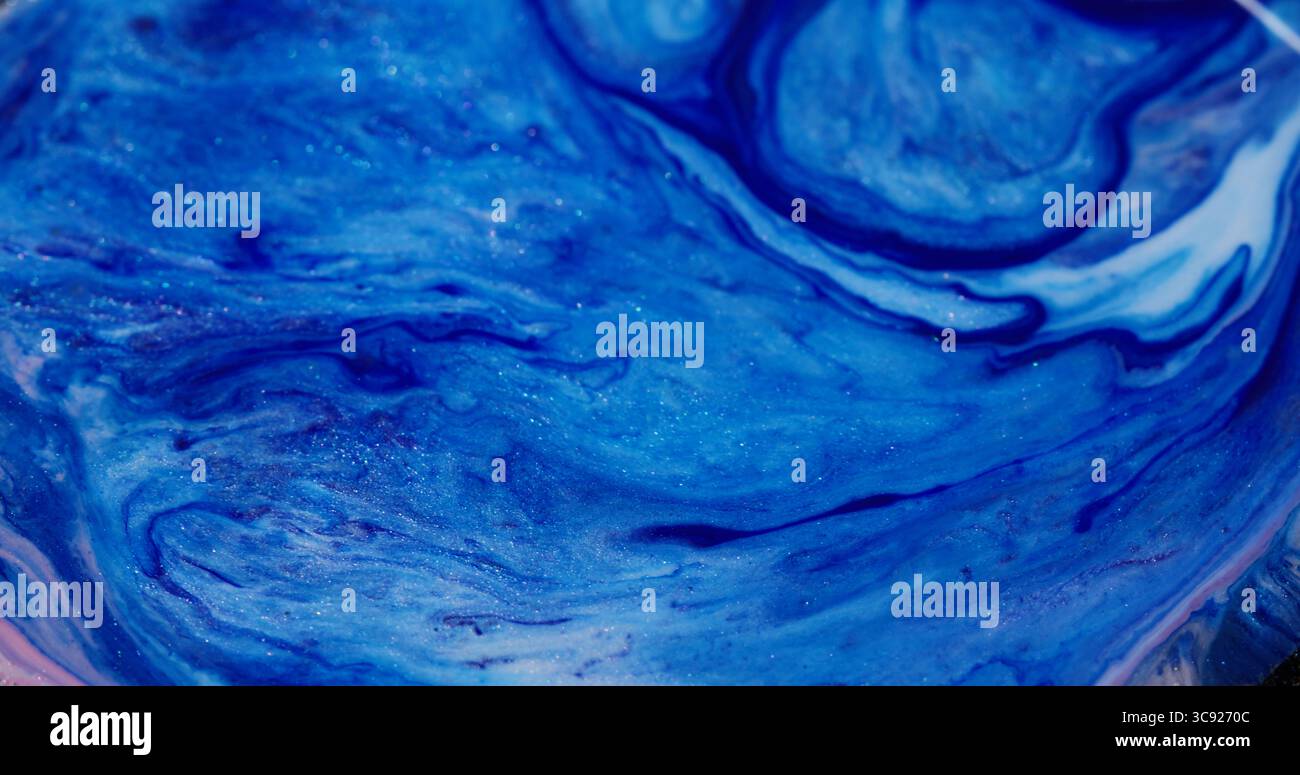 Emulsion blend. Vibrant sparkling texture. Defocused blue white color ...