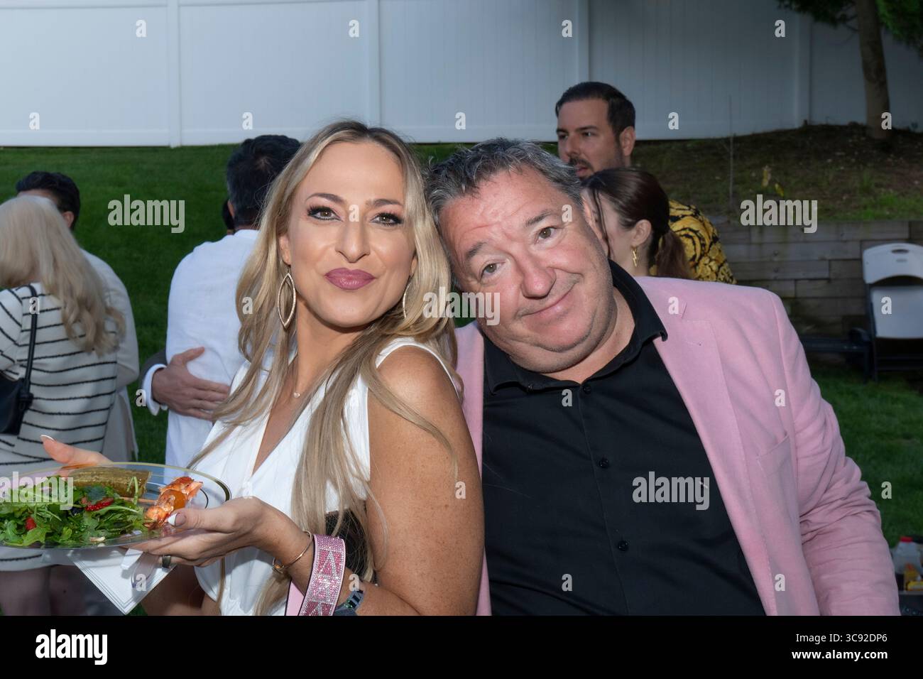 Guest and Terry Casey attends Dr David Shusterman's birthday party at a ...