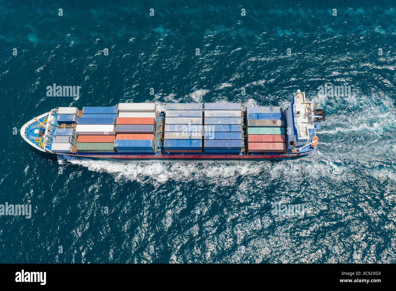 Commercial shipping. Cargo ship in sea, aerial view. Freight container ...