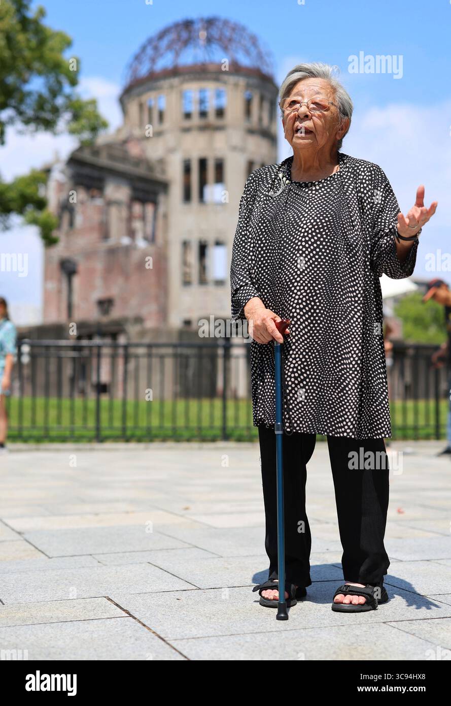 Koko Tanimoto, atomic bomb survivor, poses for photo during an interview in front of Atomic Bomb ...