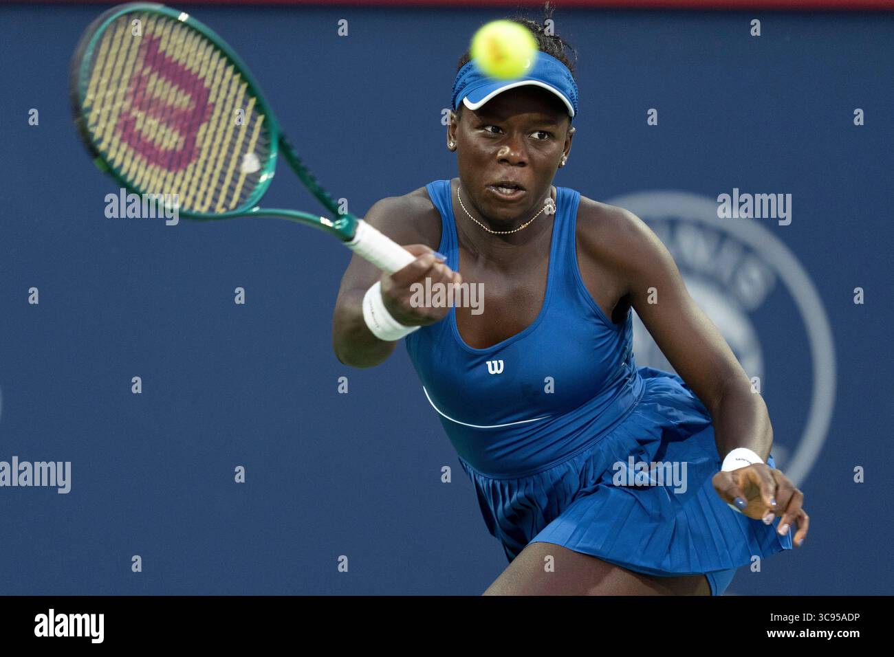 Victoria Mboko, of Canada, hits a return to Jessica Bouzas Maneiro, of ...