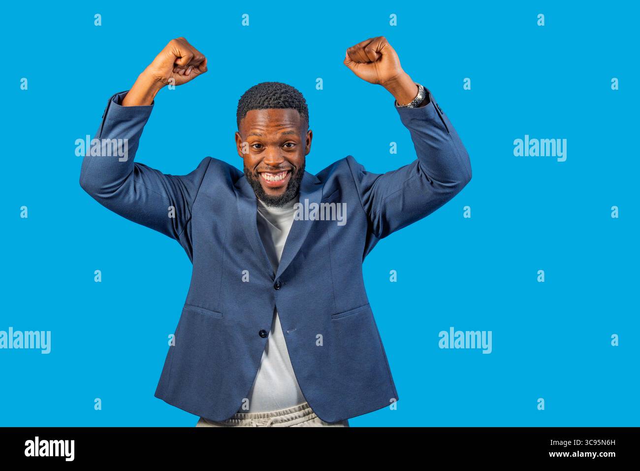 Young entrepreneur expressing joy and success, celebrating achievement ...