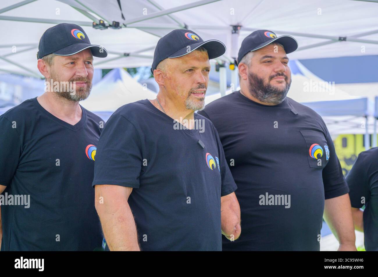 Kyiv, Ukraine - 2d August, 2025:Three Ukrainian war veterans wearing ...