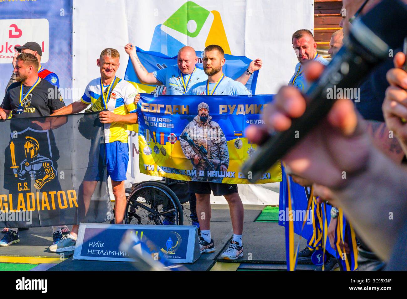 Kyiv, Ukraine - 2d August, 2025: Ukrainian war veterans holding flags ...