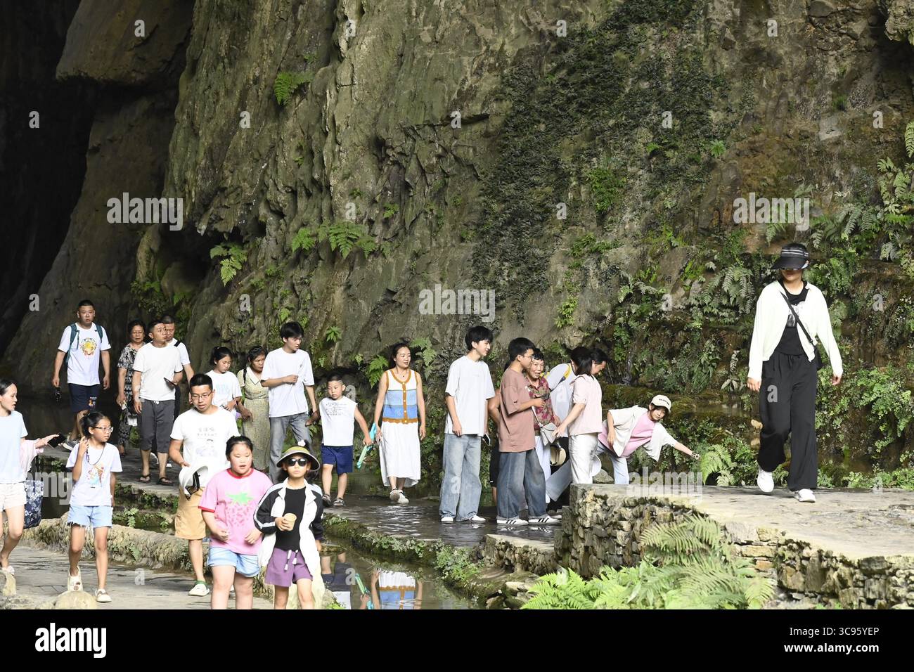 Tourists visit Taohuayuan scenic area in Chongqing, China, 2 August ...