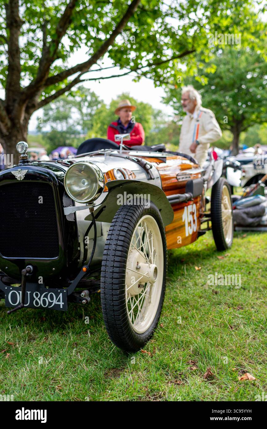 Austin 7 Special with a wooden body and white spoked wheels standing in ...