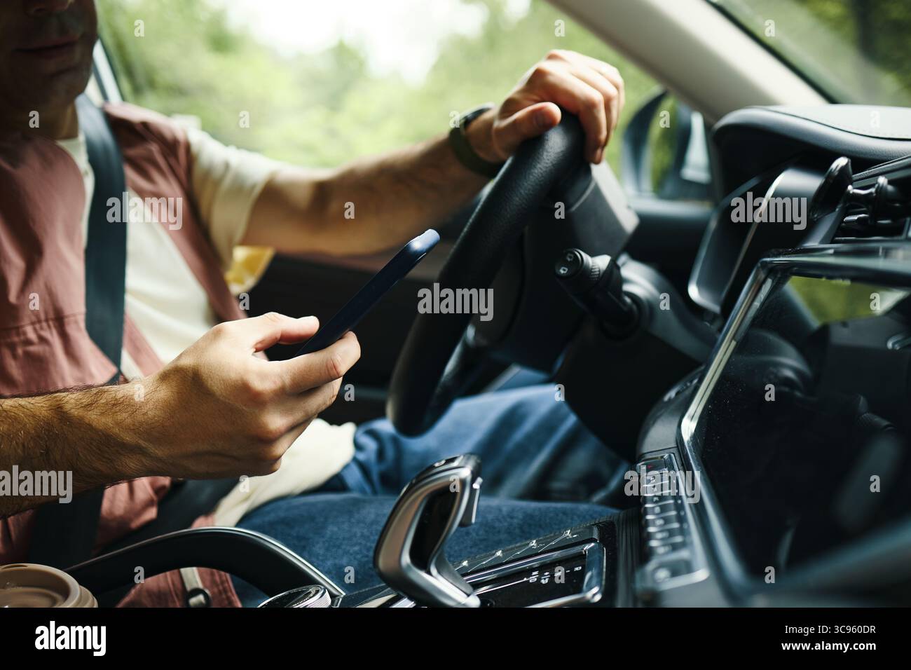 Family holding steering wheel hi-res stock photography and images - Alamy