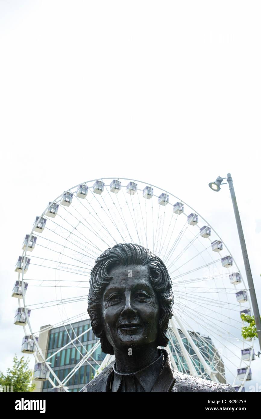Statue of Barbara Castle and the Big Wheel in Cathedral Square ...