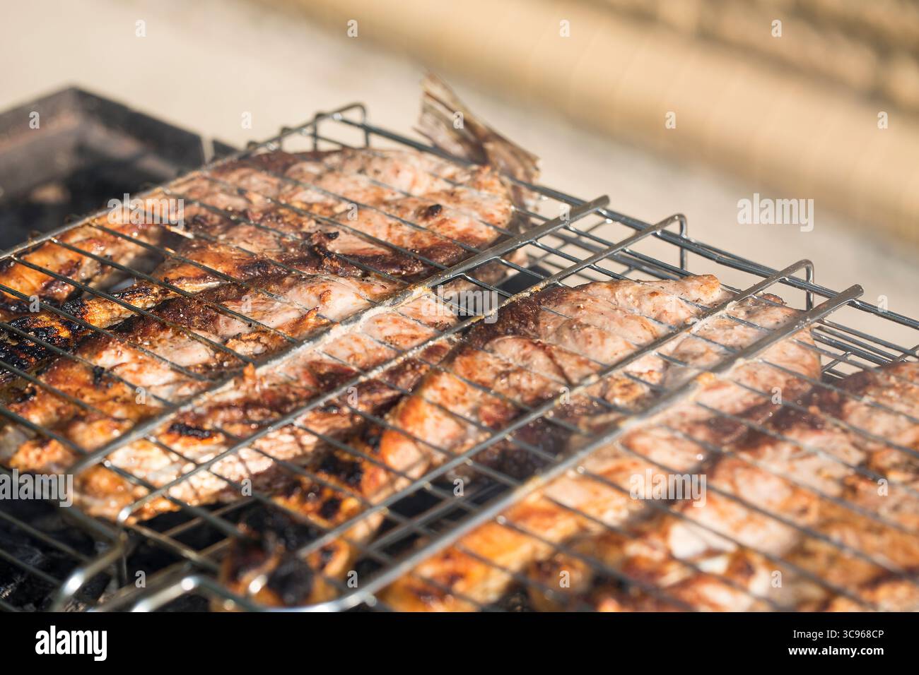 pieces of silver carp roasted close up on grill plate tasty diet fish ...