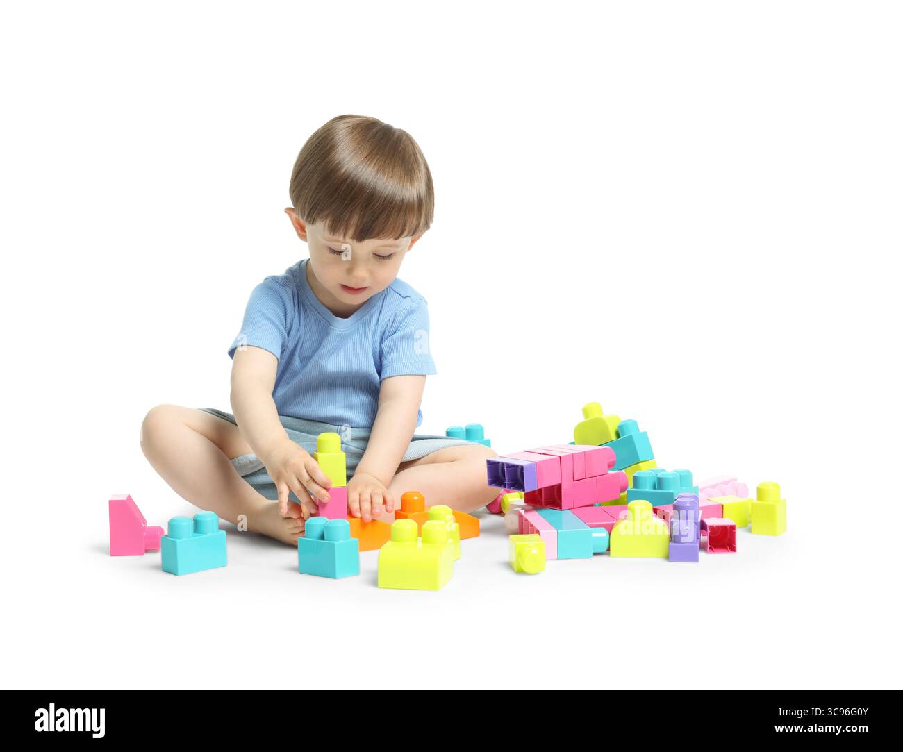 Cute little boy playing with building bricks on white background Stock ...