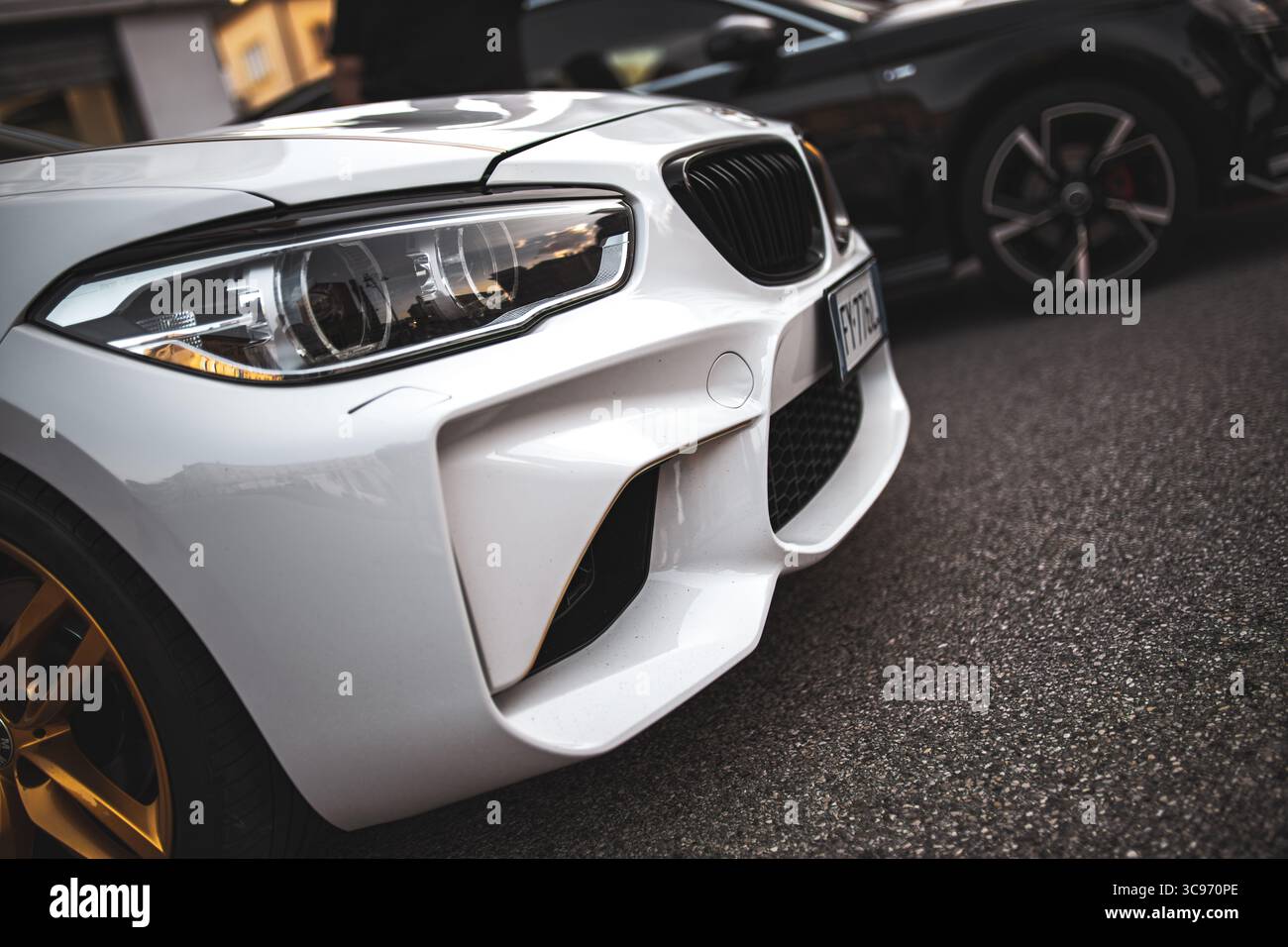 Rome, italy 5 august 2025: close-up of a white bmw m2 showcasing its ...