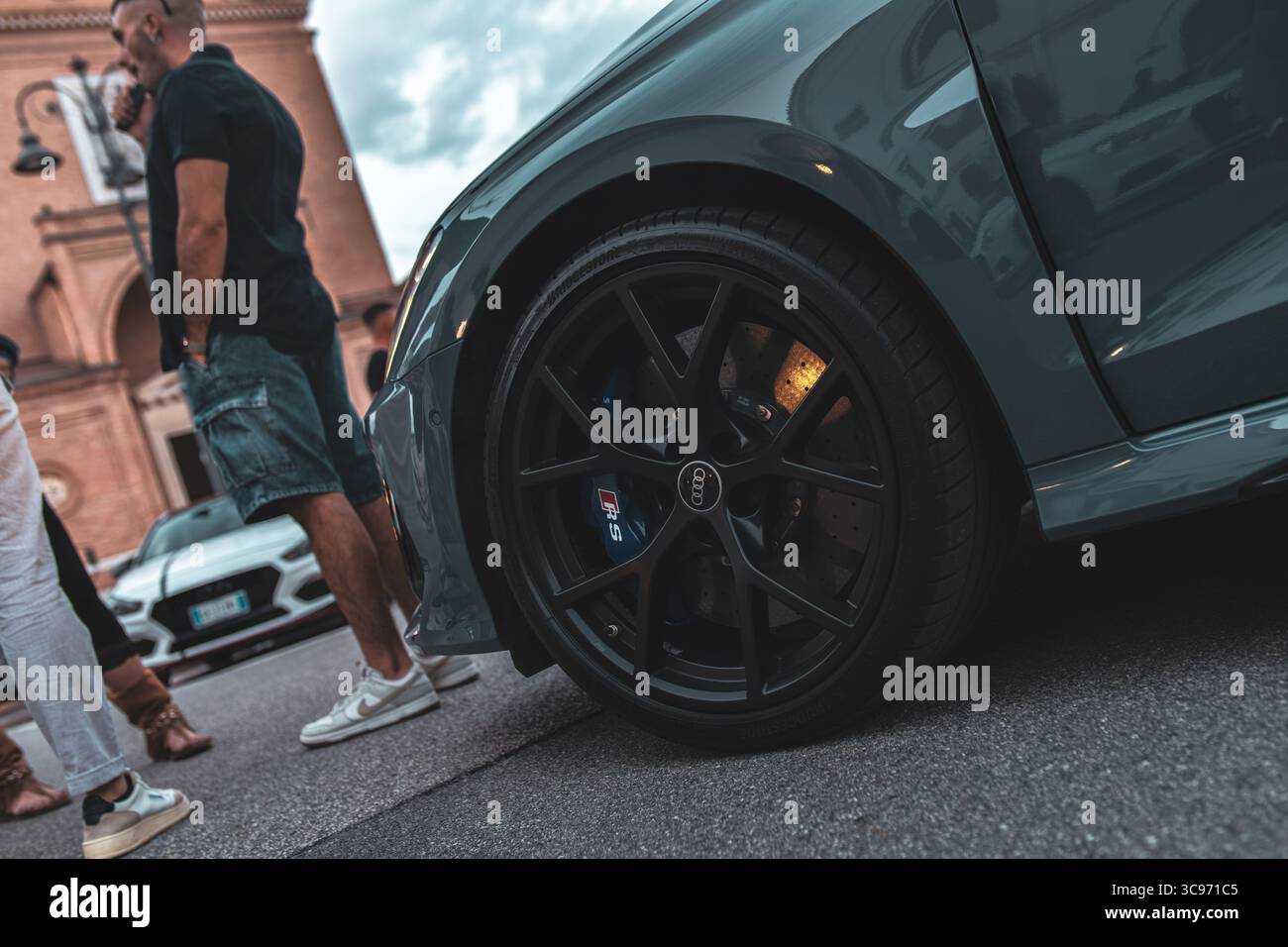 Rome, italy 5 august 2025: spectators admire a parked audi rs sports ...