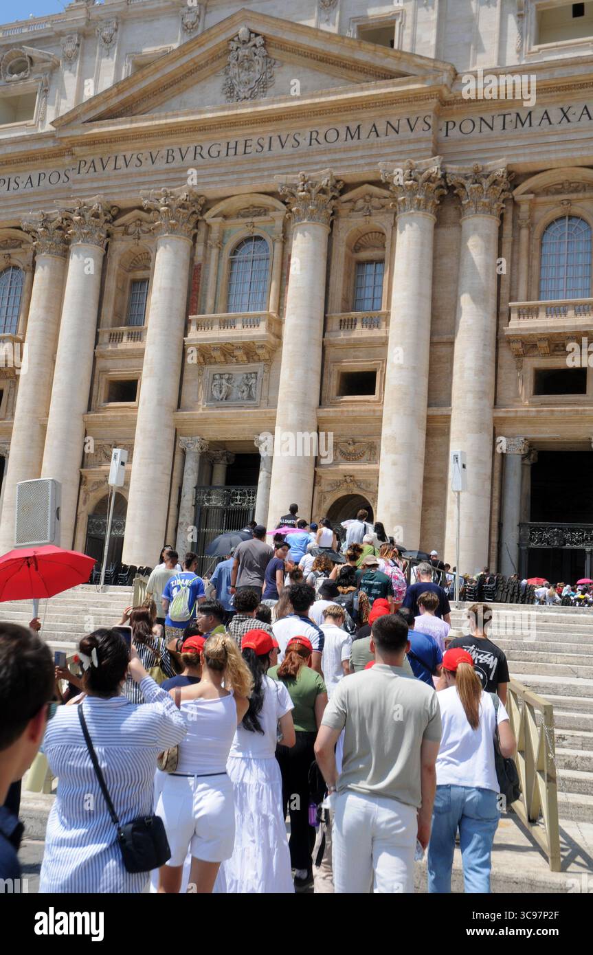 crowds queuing to enter St. Peter's Basilica, Vatican City, Rome, Italy ...