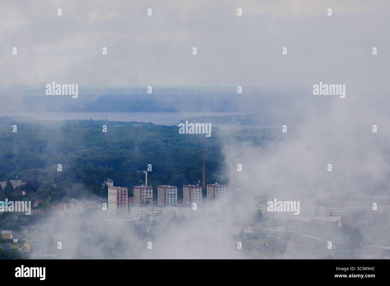 The town of Spremberg can be seen behind the cooling tower of the ...